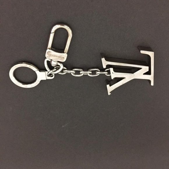 Louis Vuitton | Accessories | Louis Vuitton Porte Cles Lv Initial ...